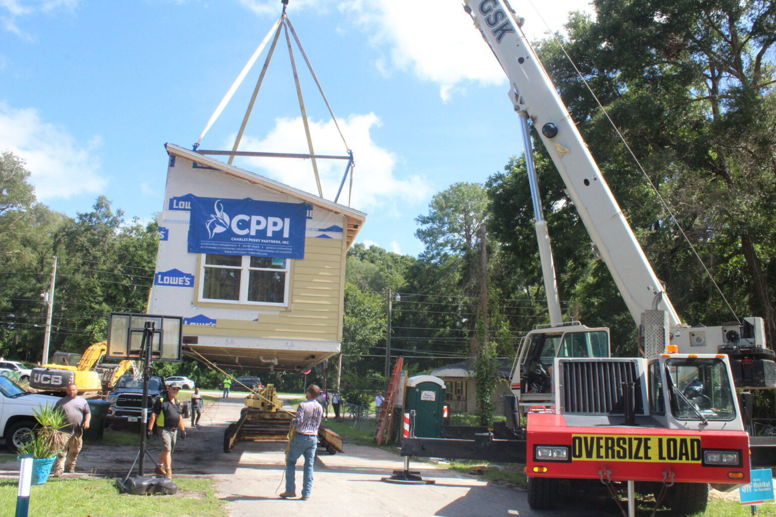 SF College moves 15th Habitat home to Alachua